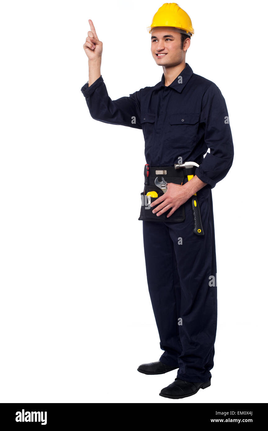 Construction worker pointing upwards Stock Photo - Alamy