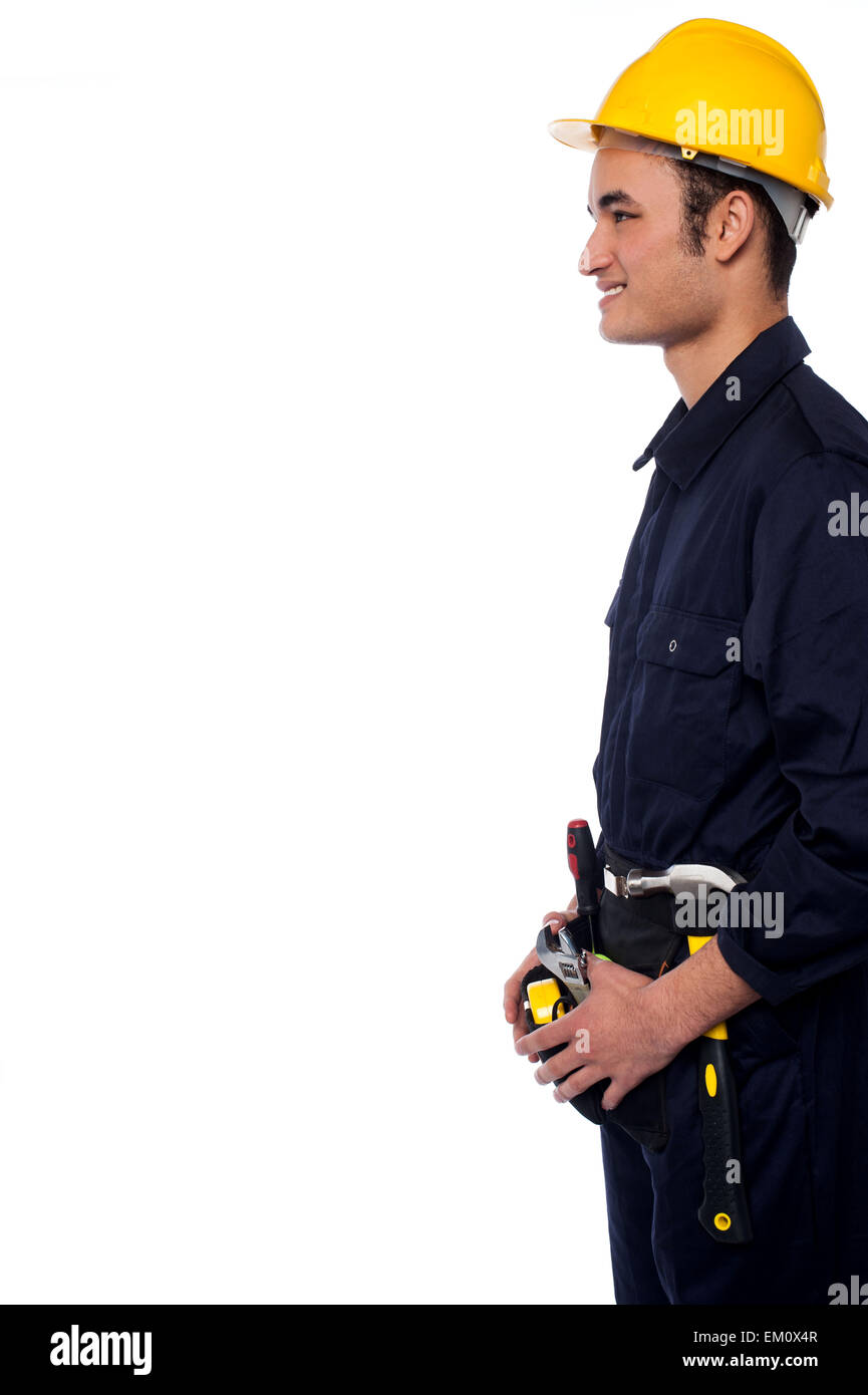 Smiling handyman isolated over white Stock Photo - Alamy