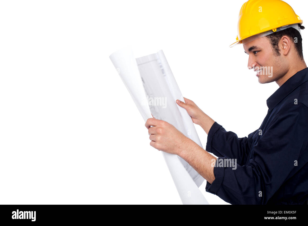 Construction worker reviewing plan Stock Photo - Alamy