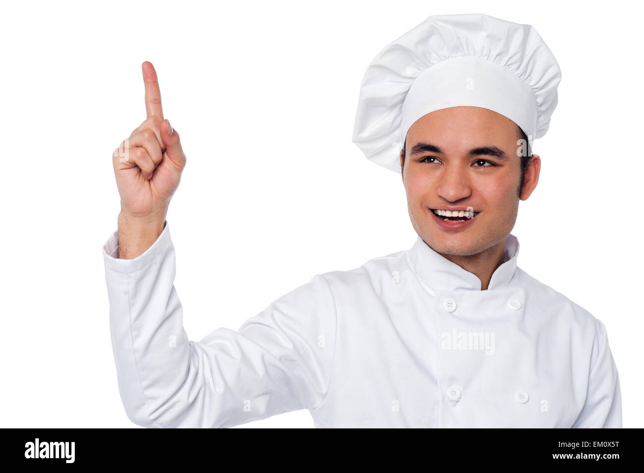 Male chef pointing upwards Stock Photo - Alamy