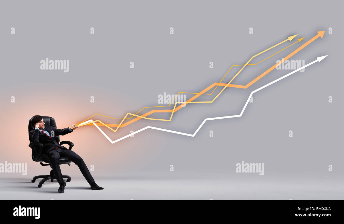 Businessman pulling graph Stock Photo - Alamy