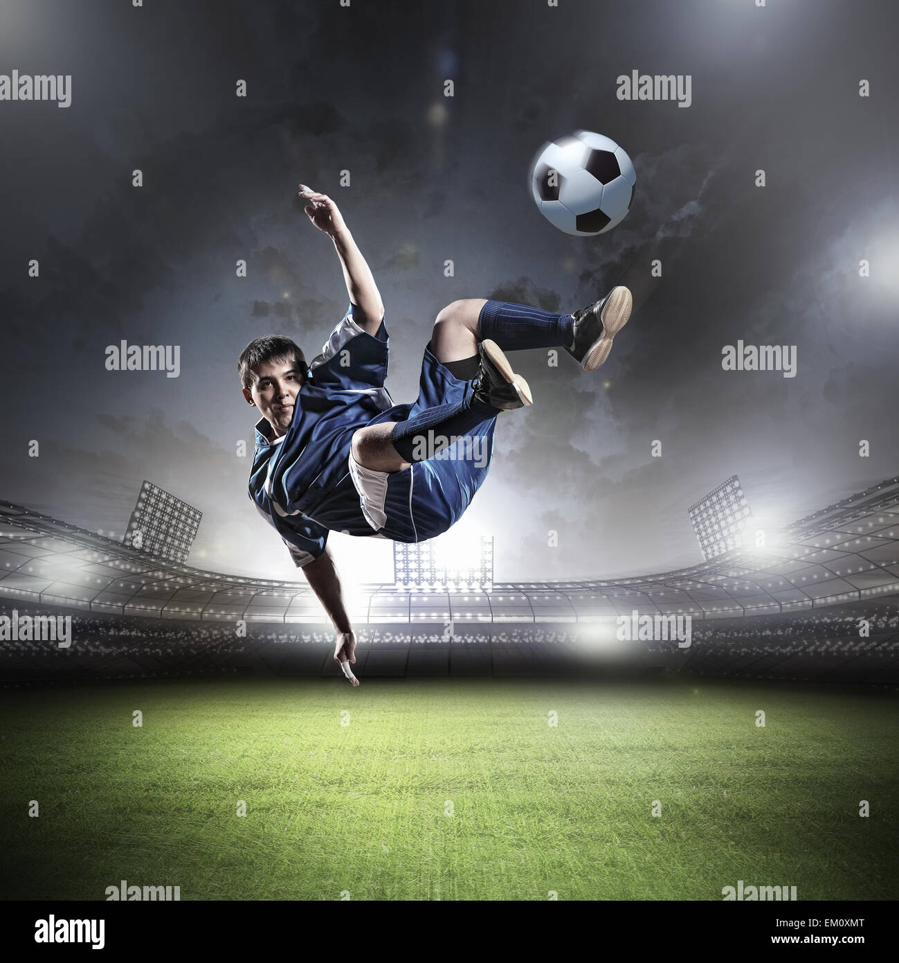 Image of football player at stadium hitting ball hi-res stock ...