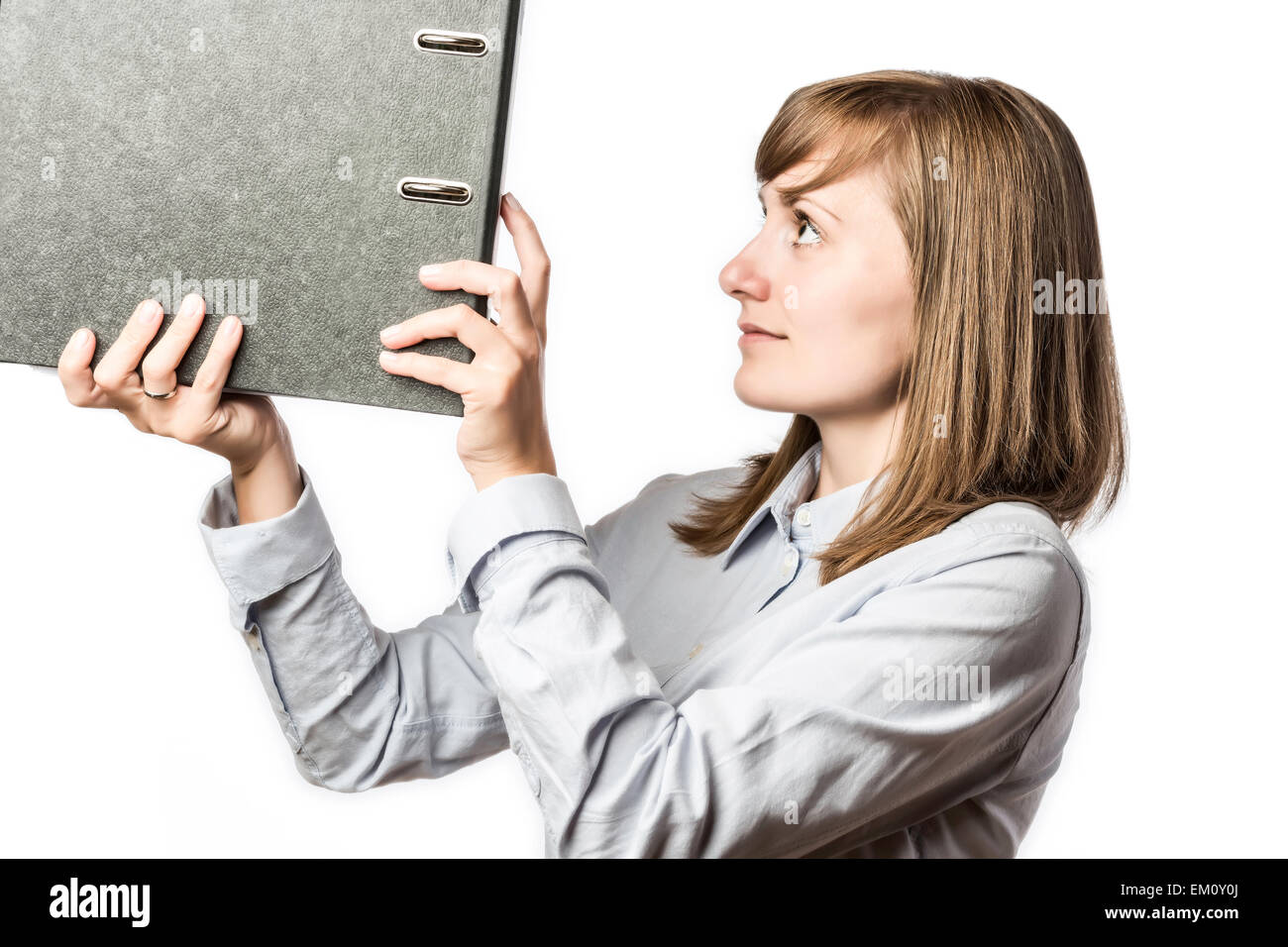 Woman takes a file folder Stock Photo - Alamy