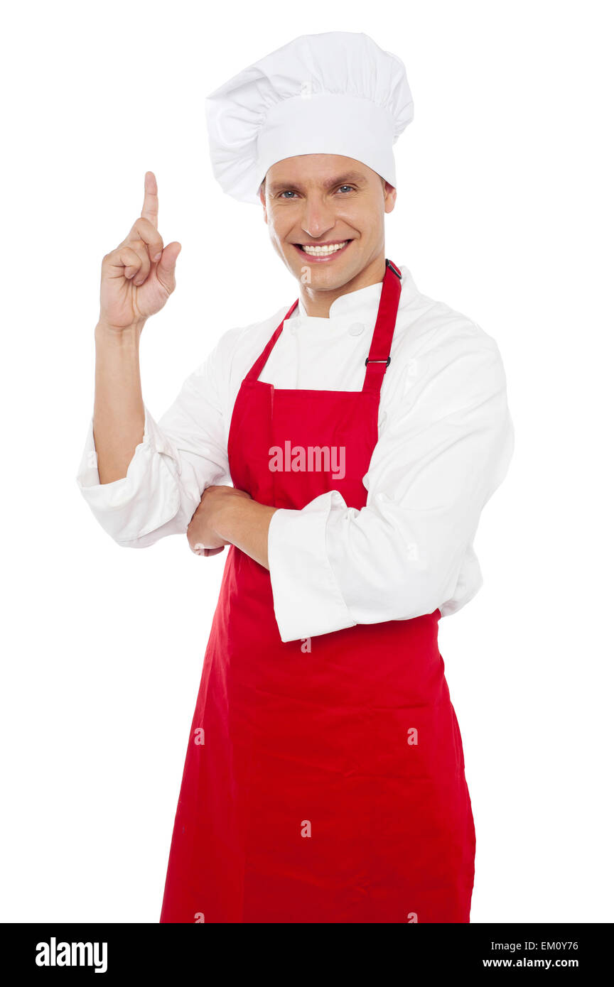 Happy chef pointing up hi-res stock photography and images - Alamy