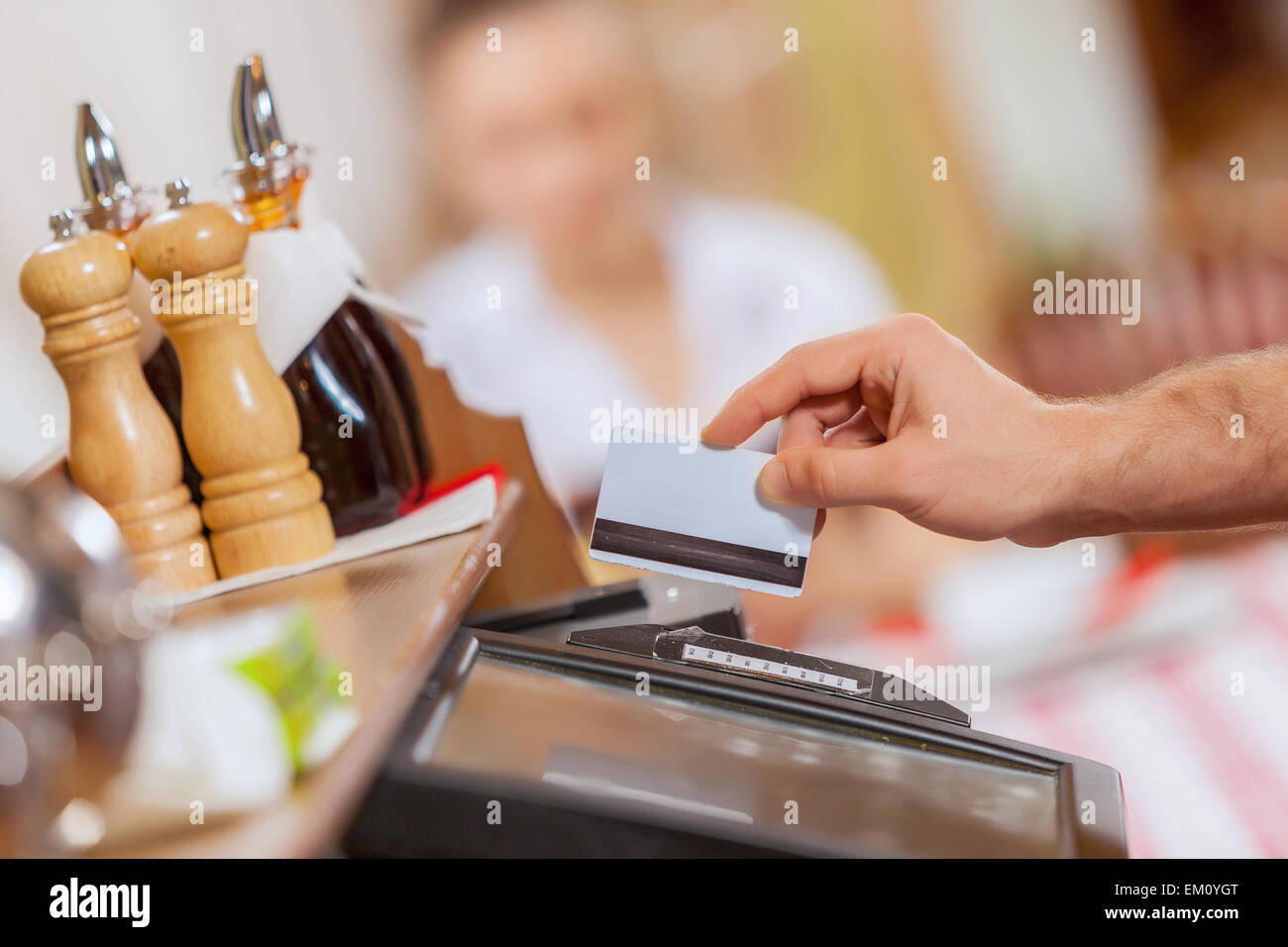 Close-up of cashier hands Stock Photo - Alamy