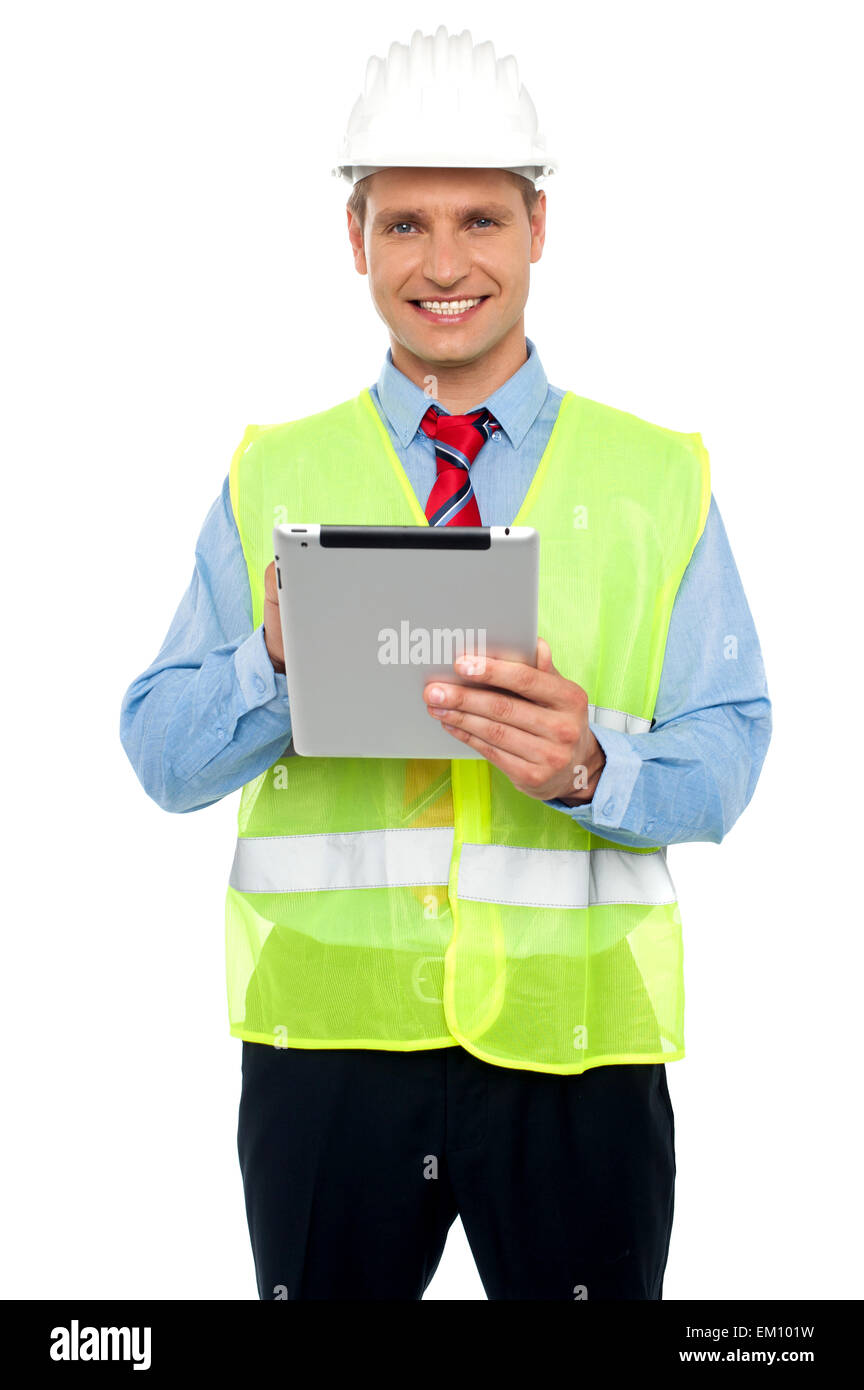 Construction manager using electronic tablet hi-res stock photography ...