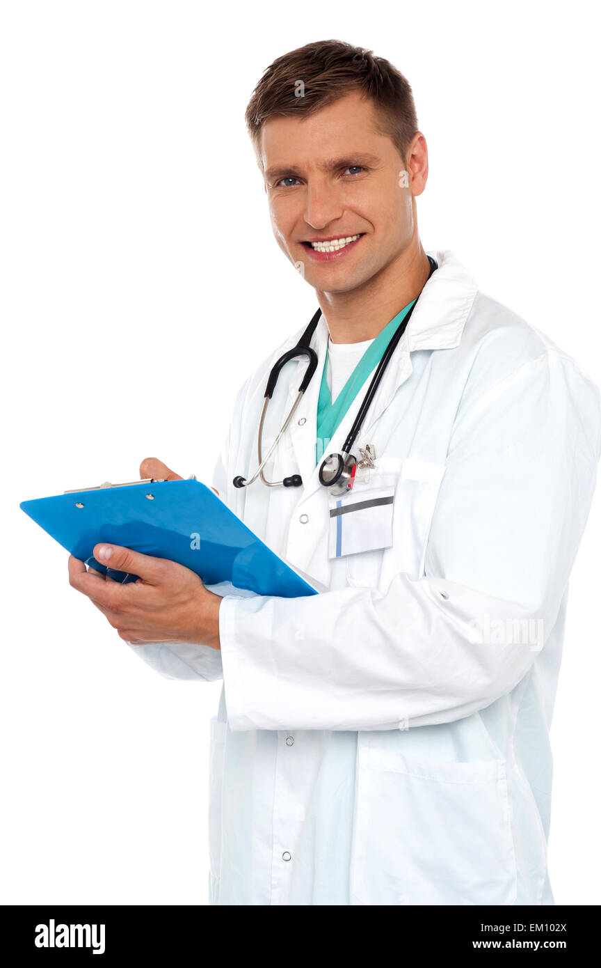 Young doctor smiling writing hi-res stock photography and images - Alamy