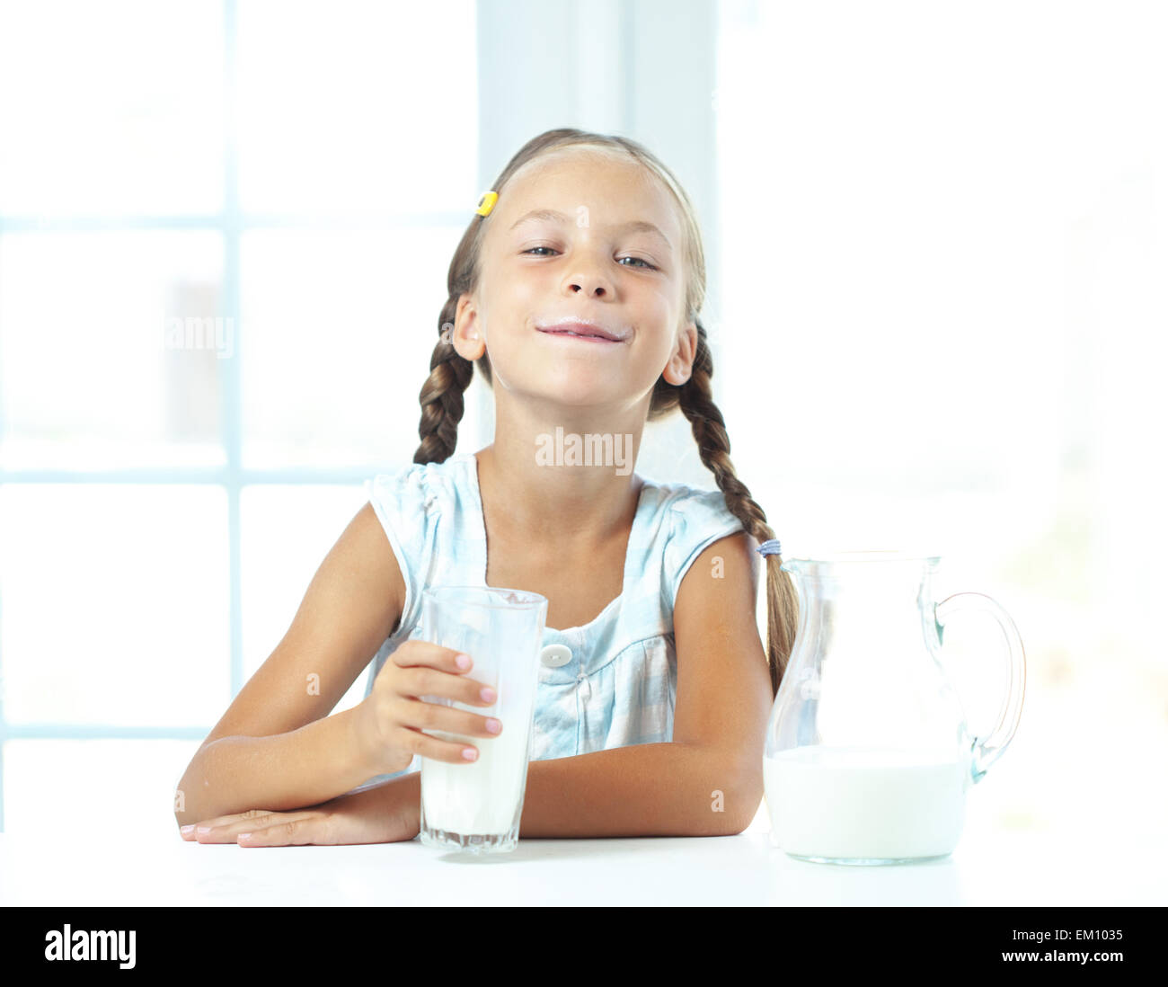 Child drinks milk Stock Photo - Alamy