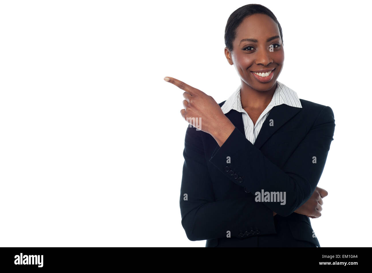 Lady pointing towards copy space area Stock Photo - Alamy