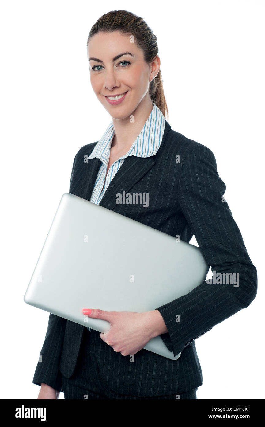 Young business executive with laptop Stock Photo - Alamy