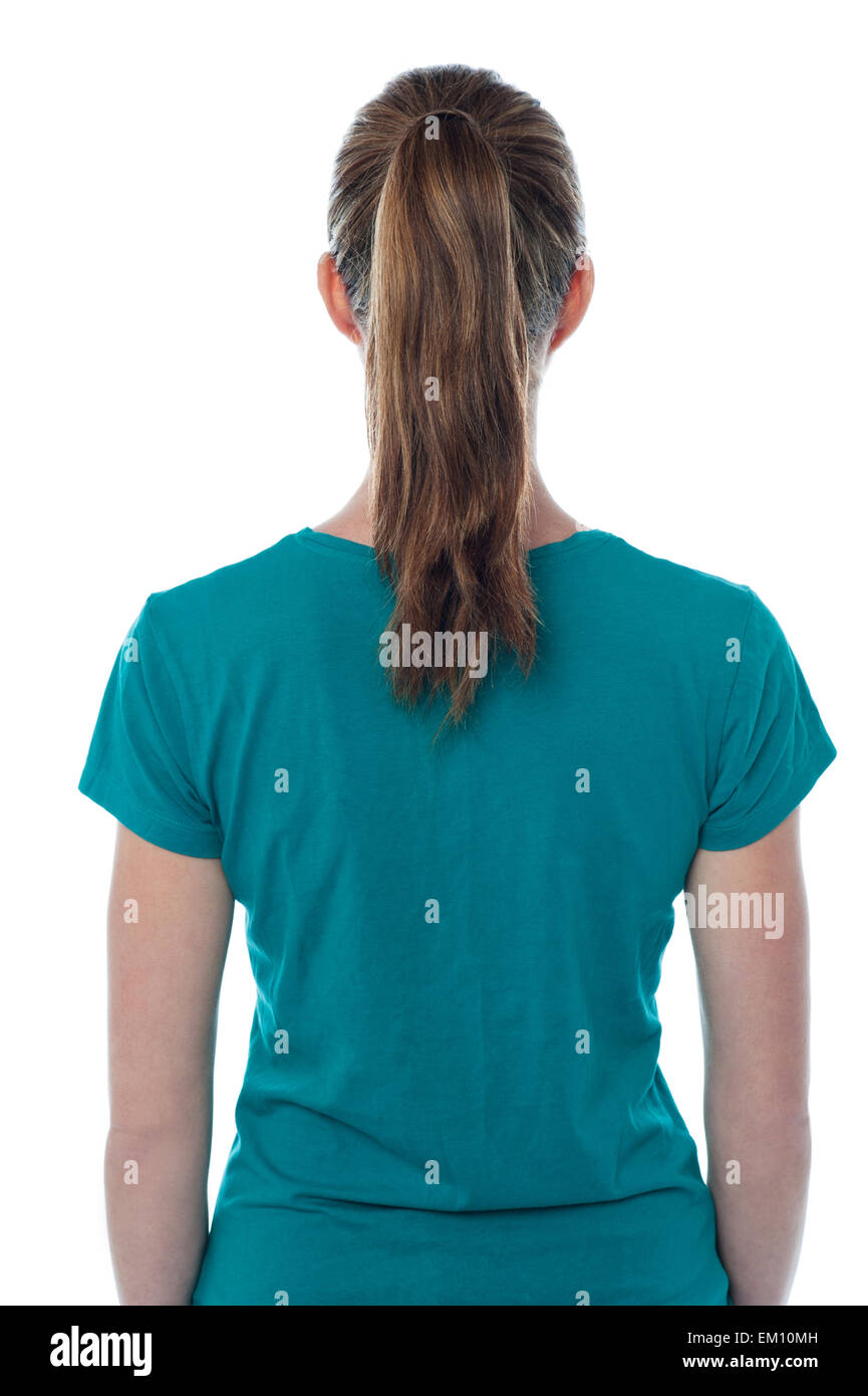 Back pose of a woman facing the wall Stock Photo - Alamy