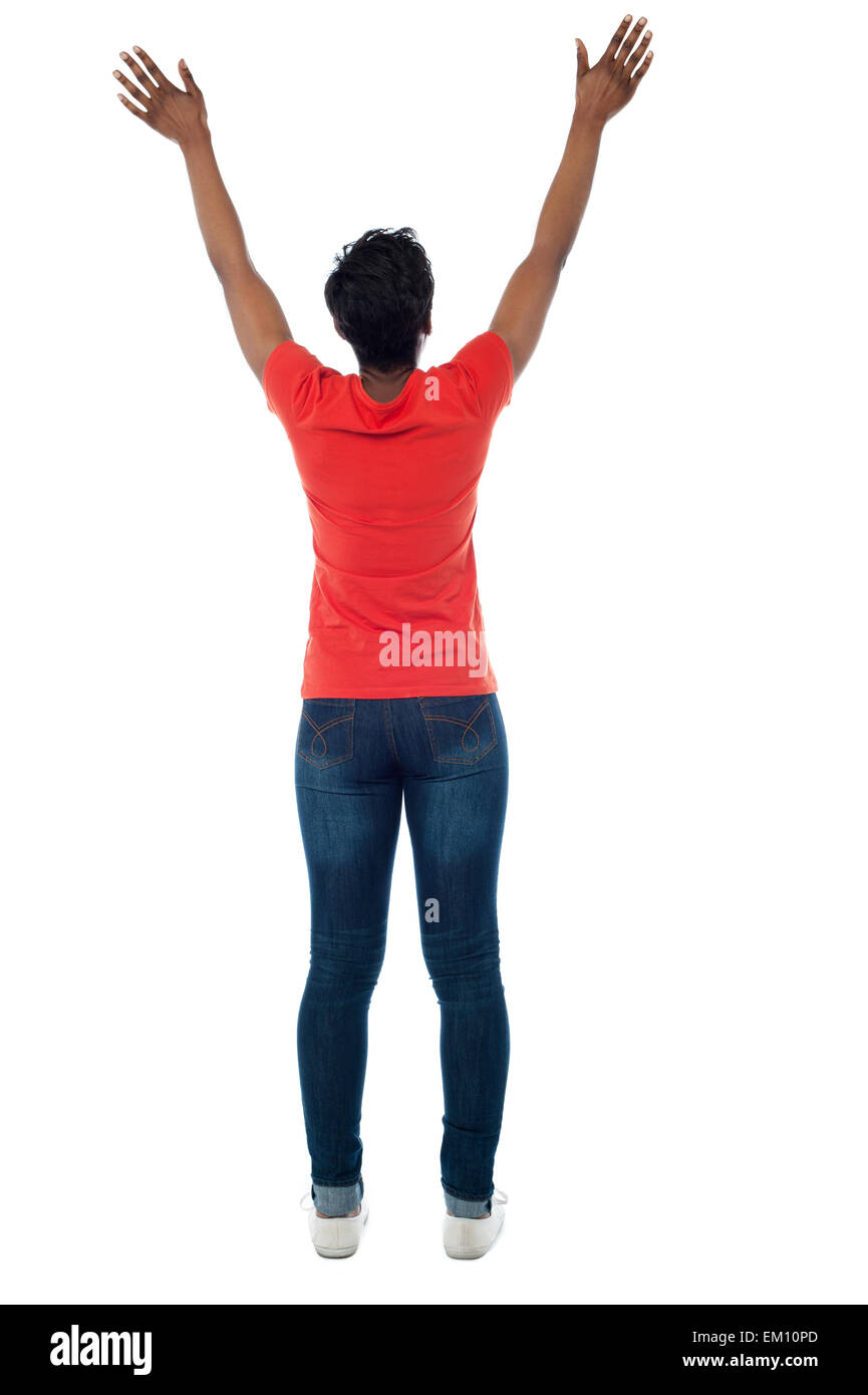 Back view raised arms hi-res stock photography and images - Alamy