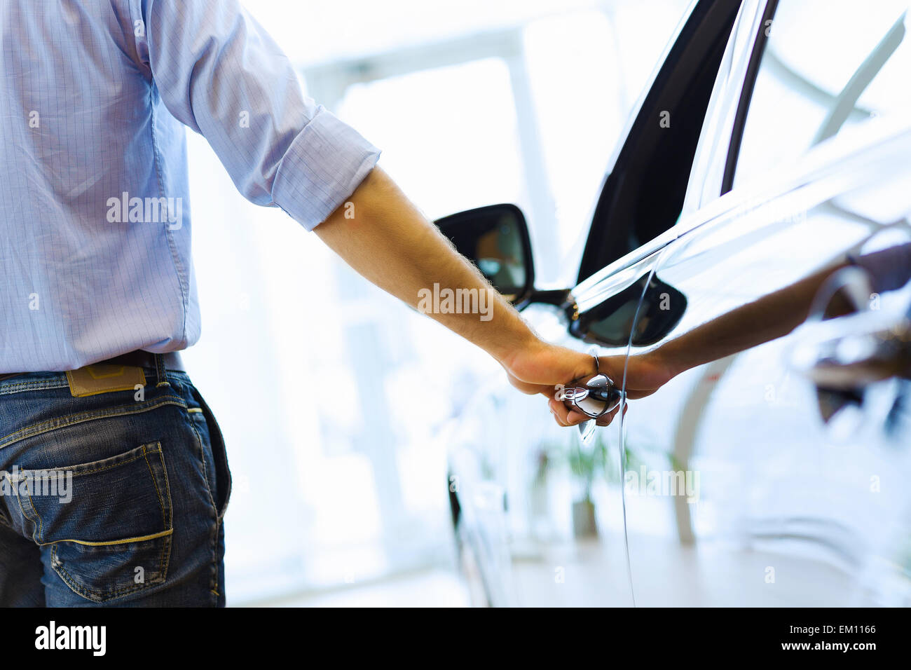 Man opening car Stock Photo - Alamy