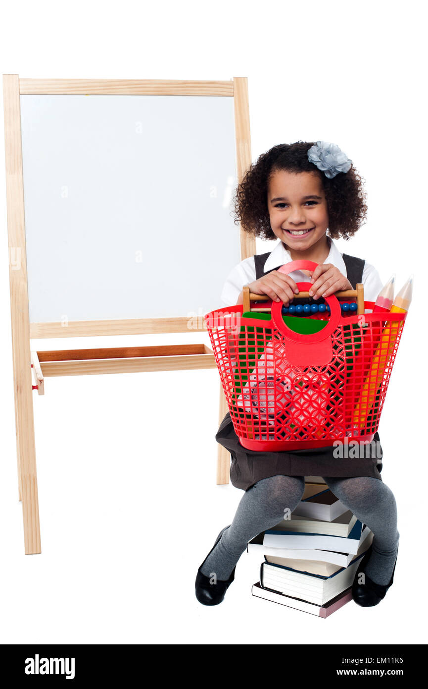 Child carrying books class hi-res stock photography and images - Alamy