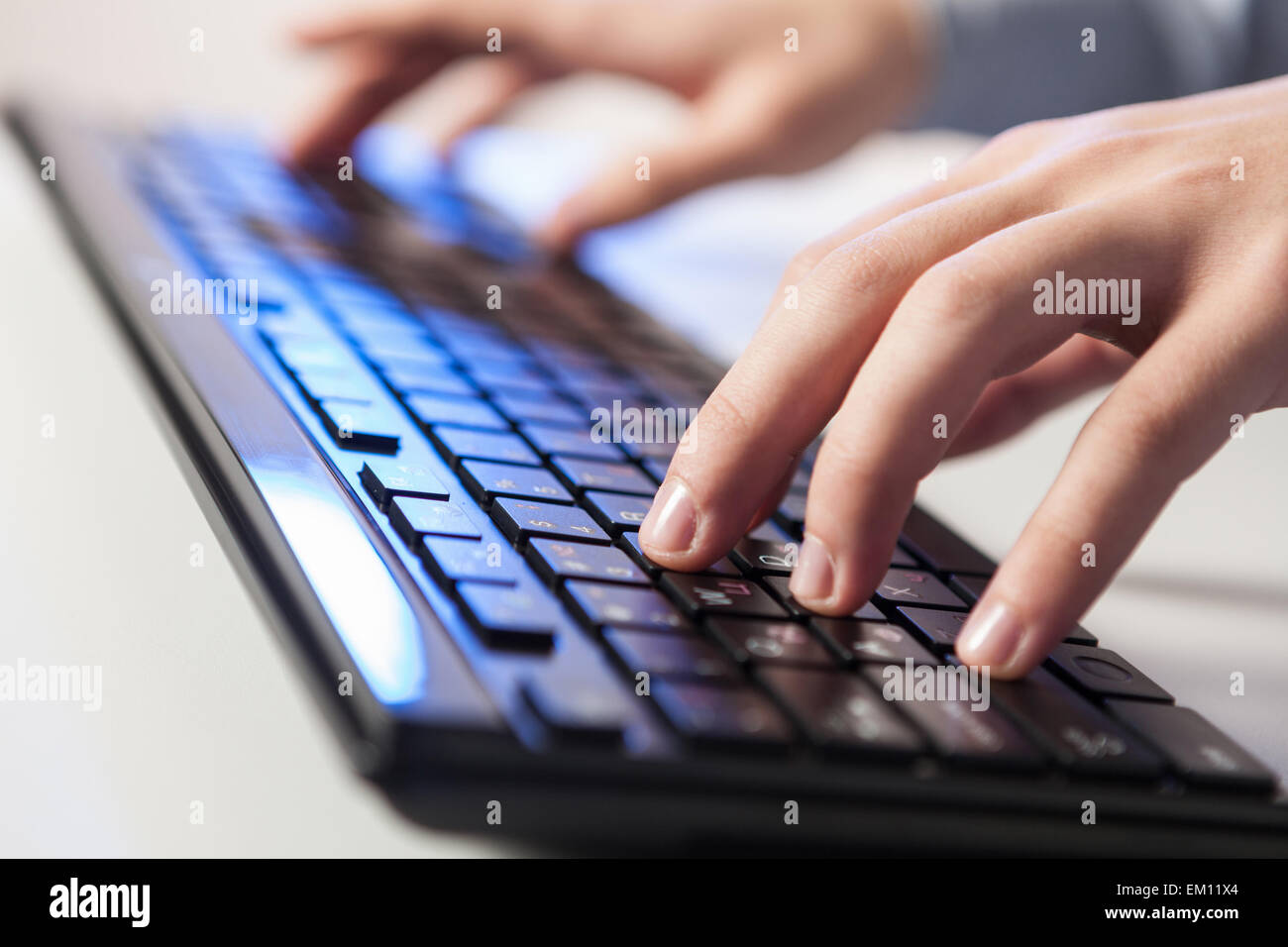 Click! Hands of a man on keyboard Stock Photo - Alamy