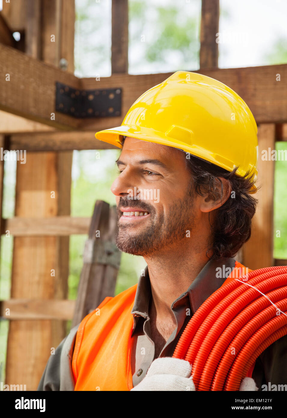 Worker With Pipe At Site Stock Photo - Alamy
