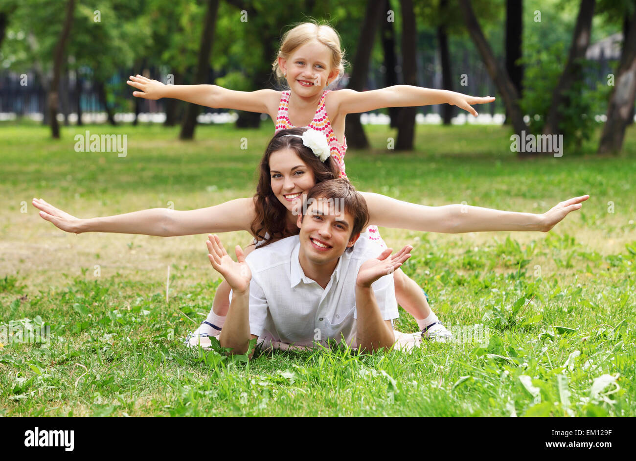 happy family having fun outdoors Stock Photo - Alamy