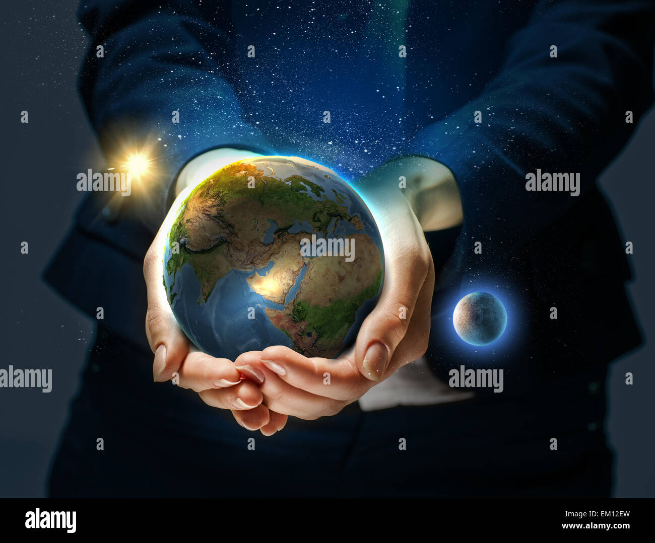 Earth planet in hands Stock Photo - Alamy