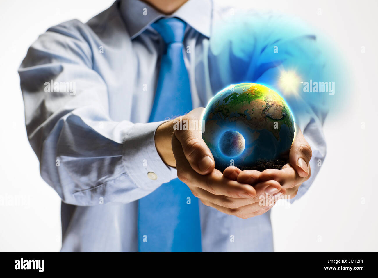 Earth planet in hands Stock Photo - Alamy