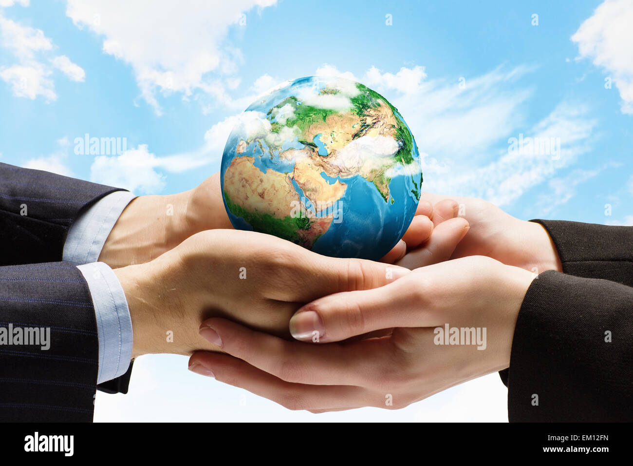 Earth planet in hands Stock Photo - Alamy