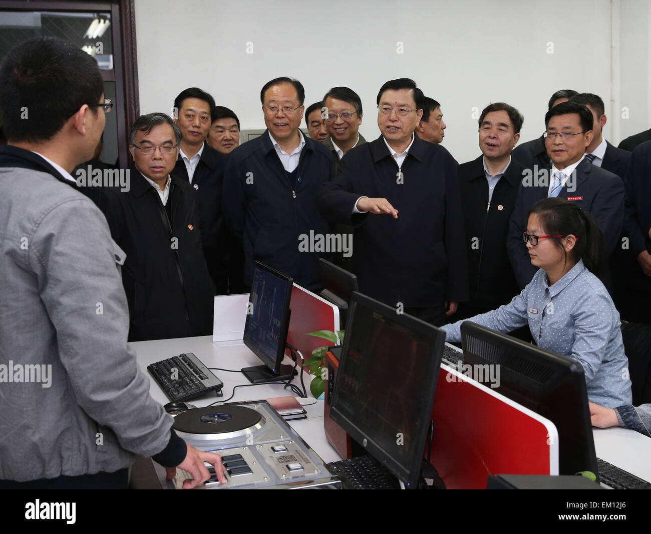 Zhengzhou, China's Henan Province. 13th Apr, 2015. Zhang Dejiang (C ...