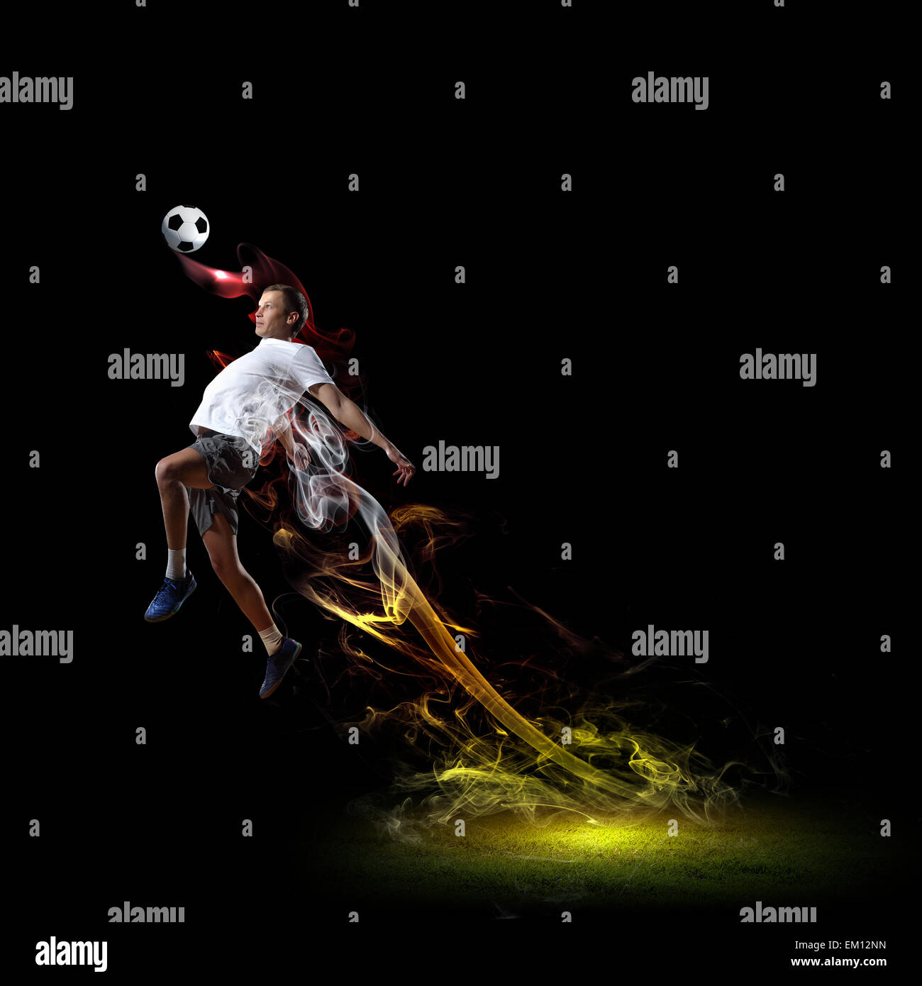 Football player with ball Stock Photo - Alamy