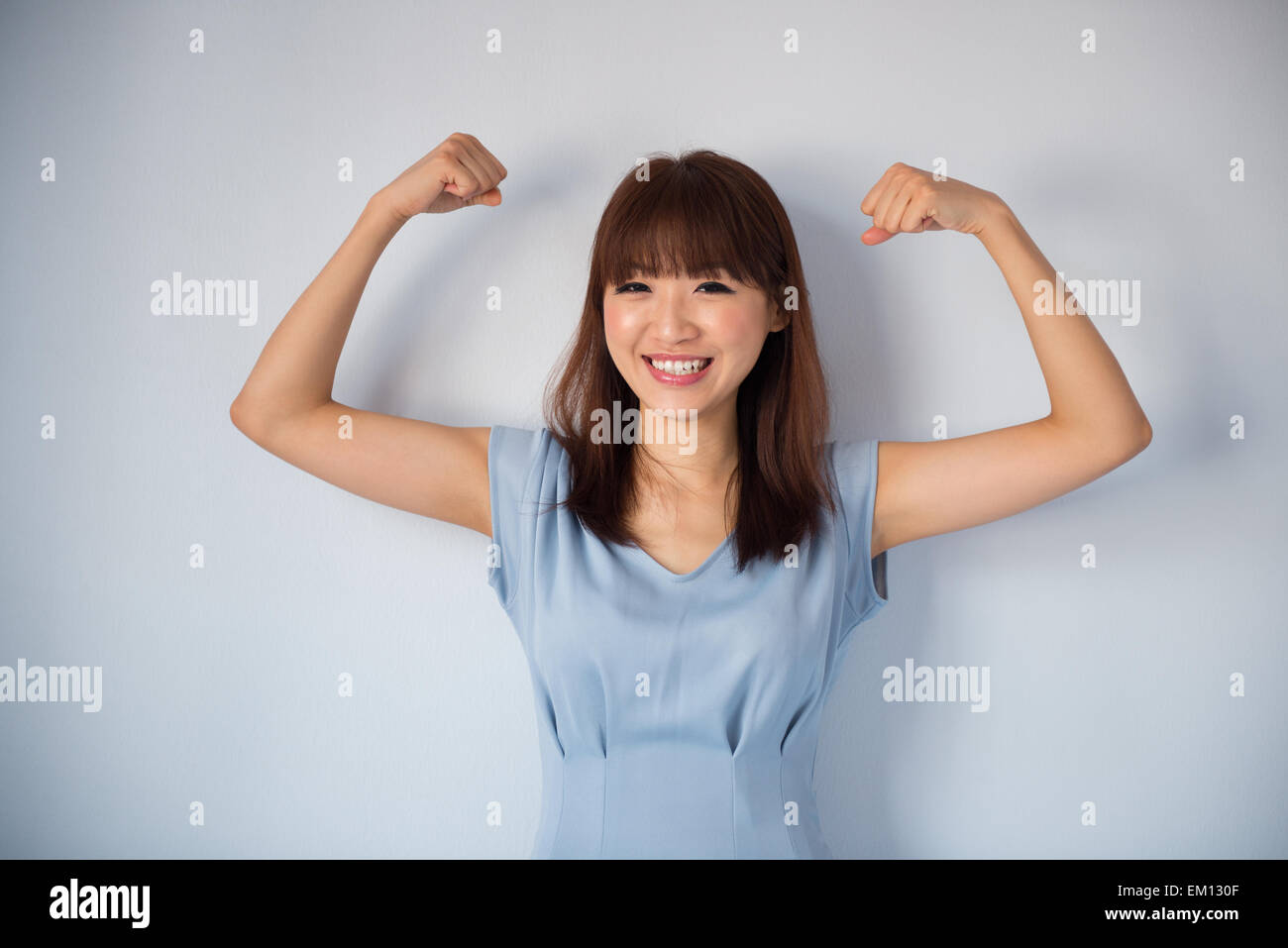 Portrait funny strong muscle asian hi-res stock photography and images ...