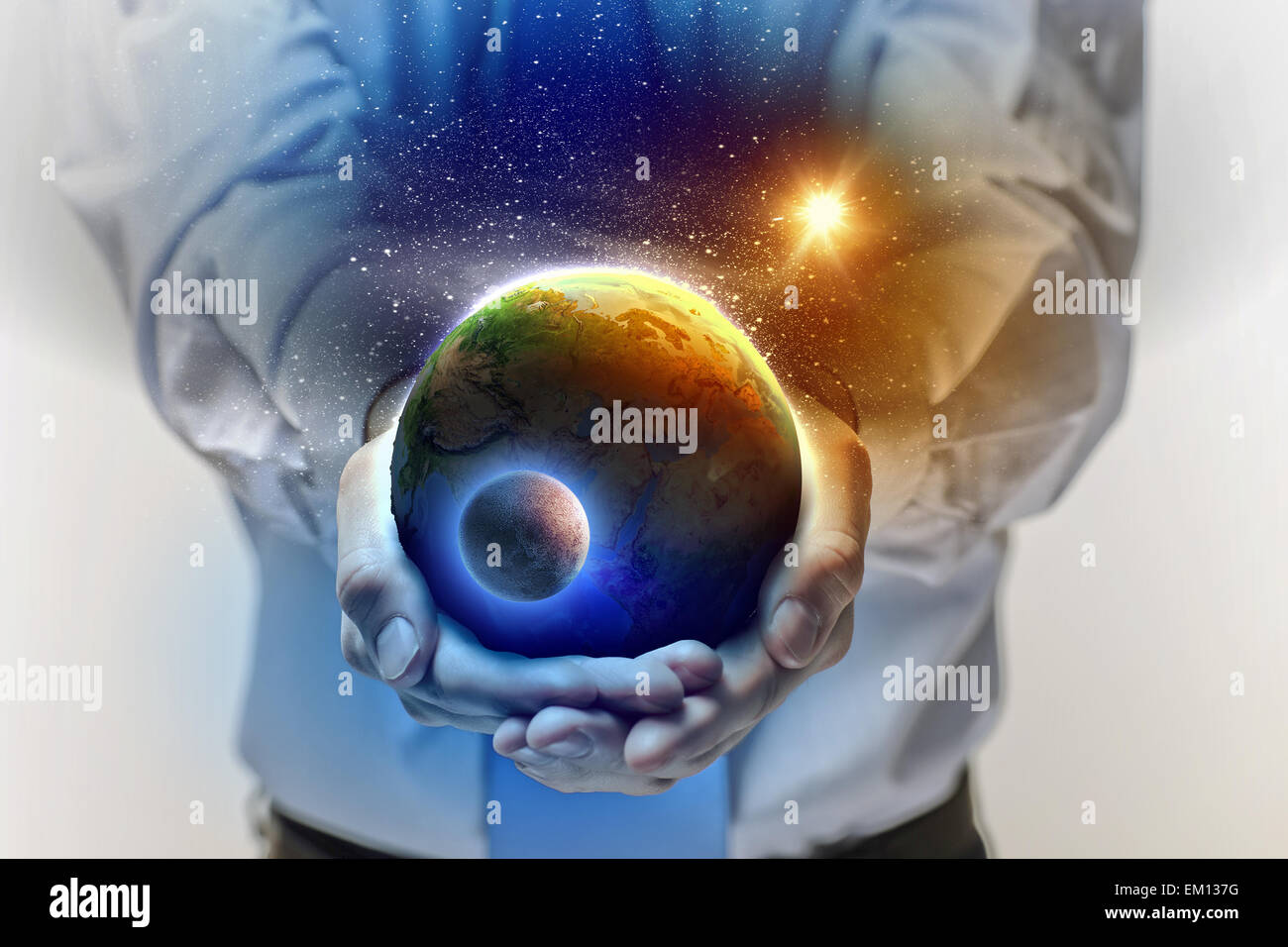 Earth planet in hands Stock Photo - Alamy