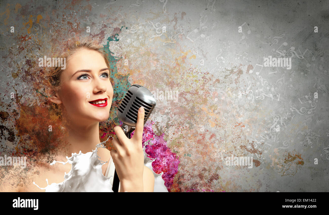 Female blonde singer Stock Photo - Alamy
