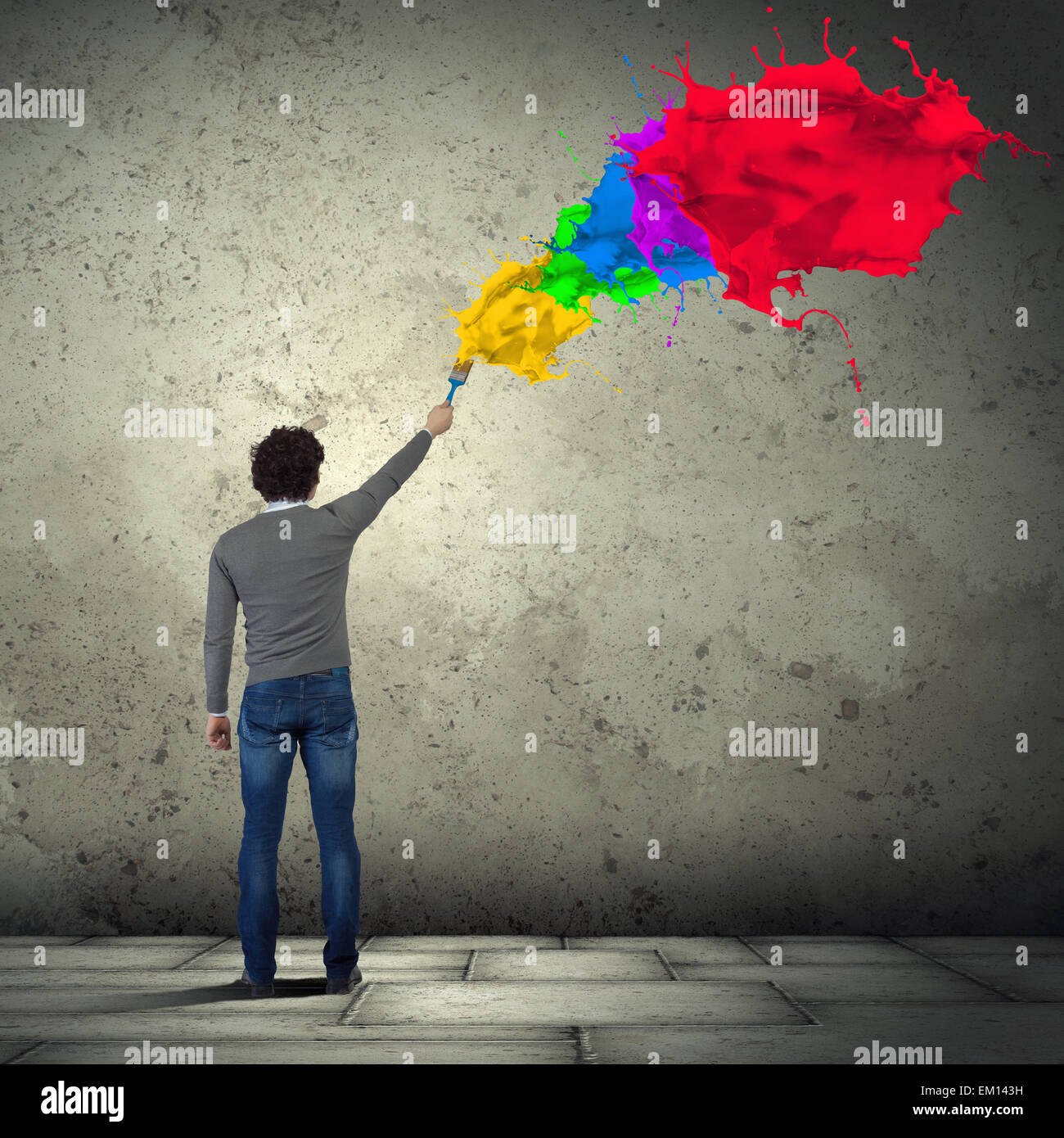 Young man and colour splash Stock Photo - Alamy