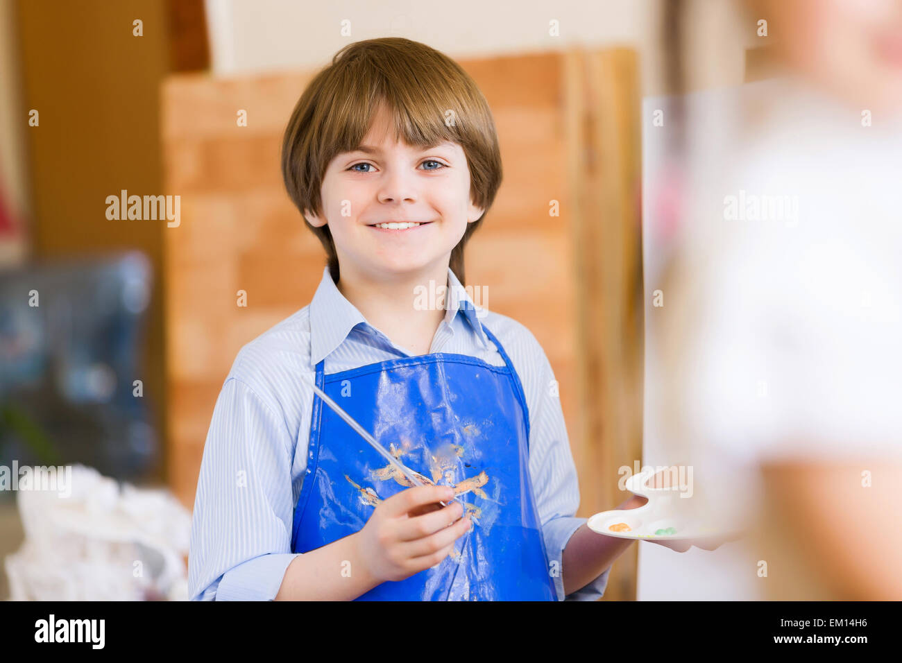 Cute boy painting Stock Photo - Alamy