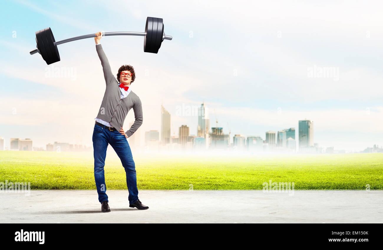 Weight Lifting businessman Stock Photo - Alamy