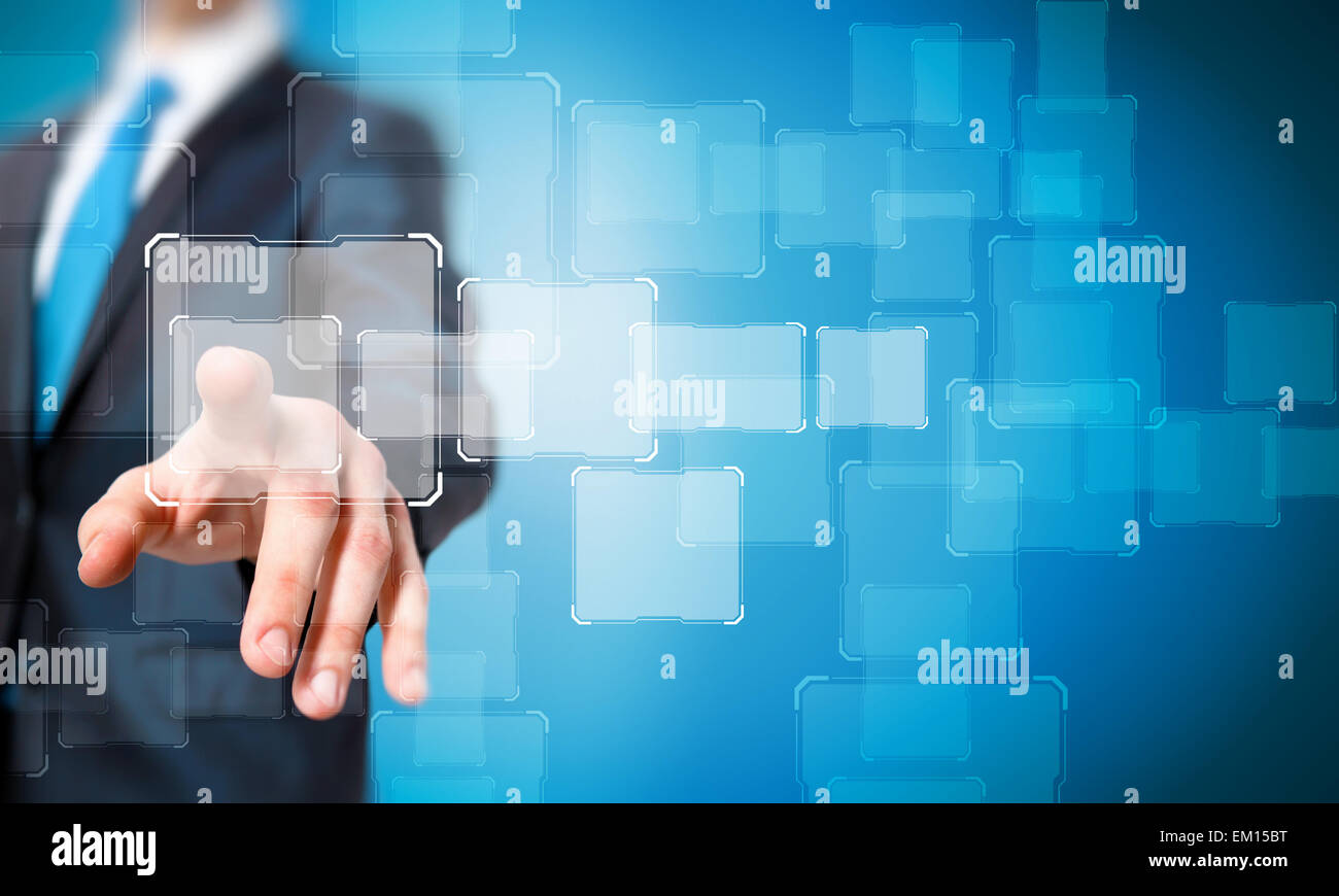 Businessman touching icon Stock Photo - Alamy