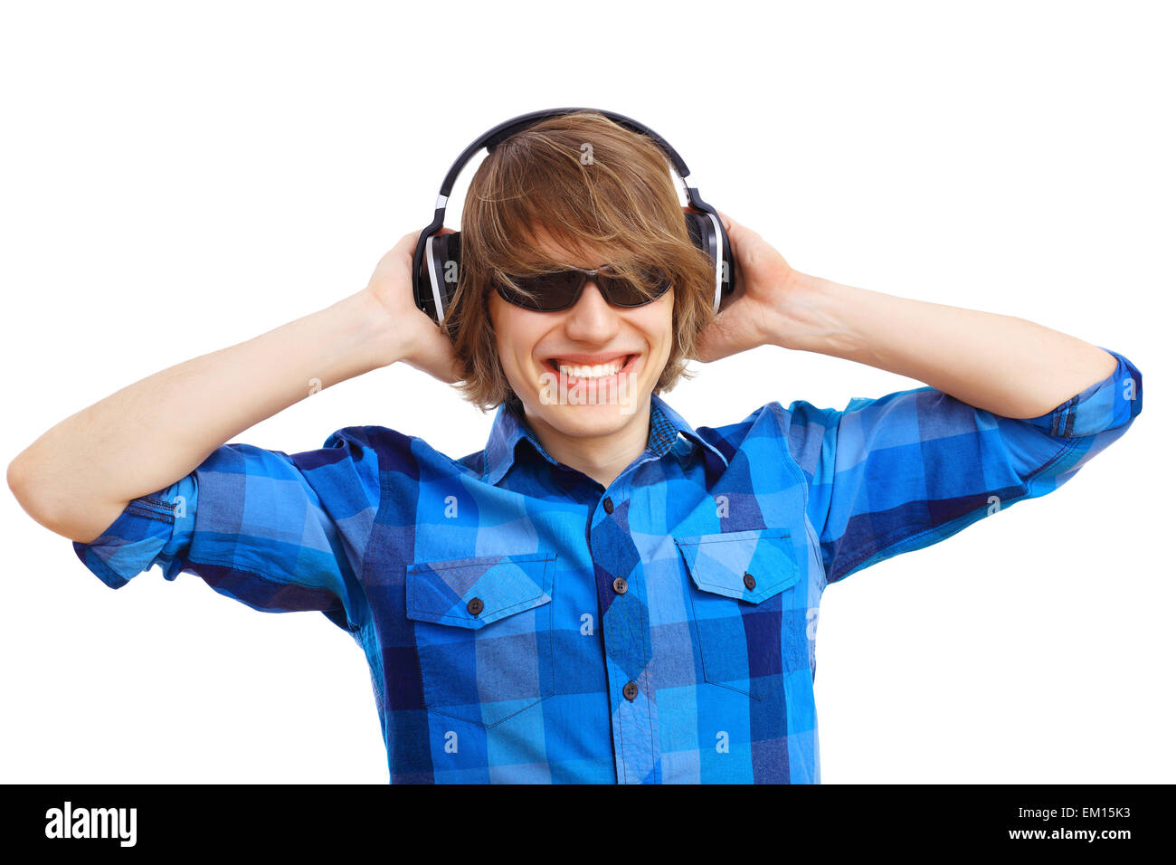 Happy smiling young man dancing Stock Photo - Alamy