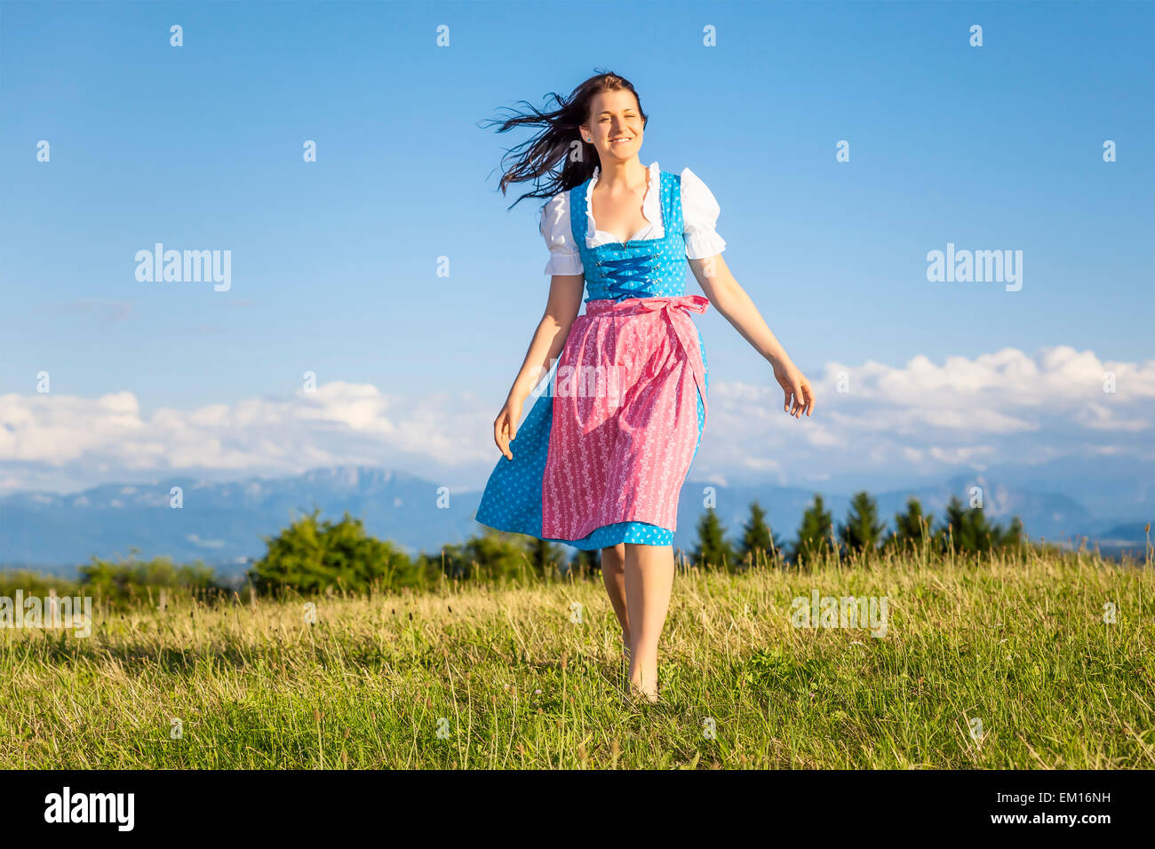 woman in bavarian traditional dirndl Stock Photo - Alamy