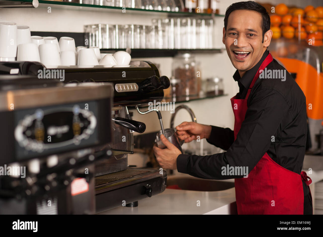 Happy barista hi-res stock photography and images - Alamy