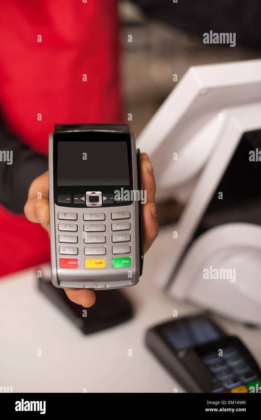 Swipe your card please to process the payment Stock Photo - Alamy