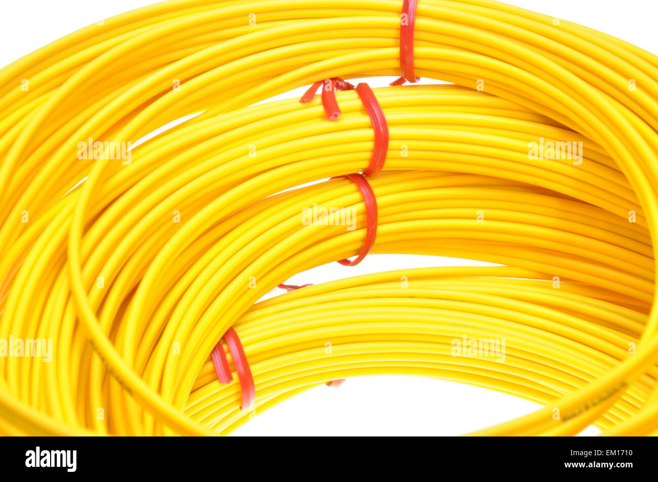 Yellow fiber optic cables isolated on white background Stock Photo - Alamy