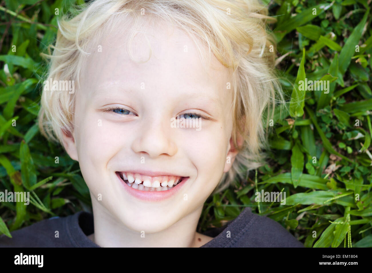 Happy smiling cute boy Stock Photo - Alamy