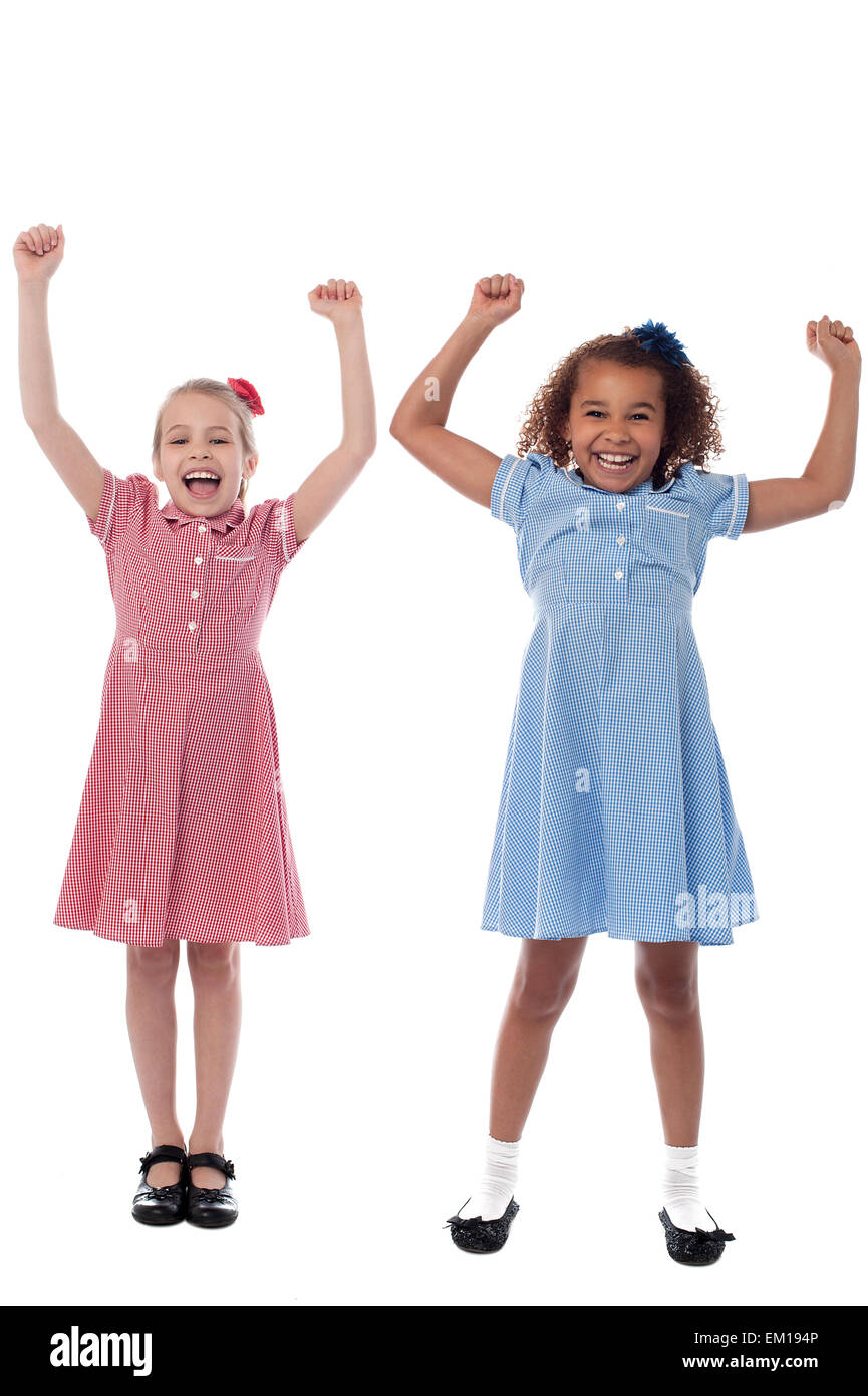 Two excited young girls in joyous mood Stock Photo - Alamy