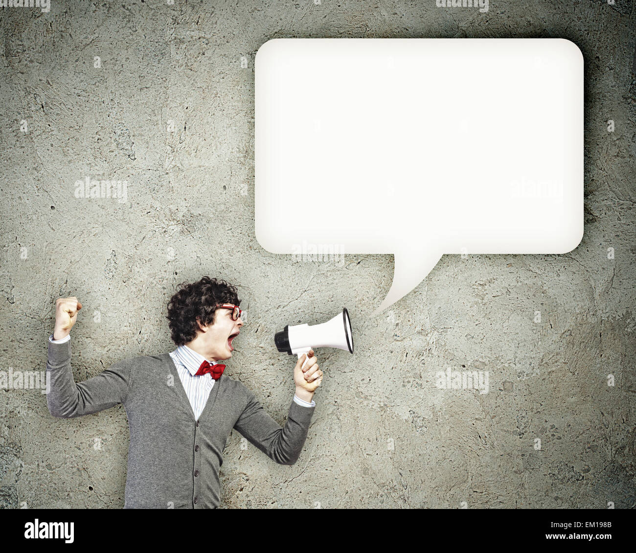 Young man with megaphone Stock Photo - Alamy
