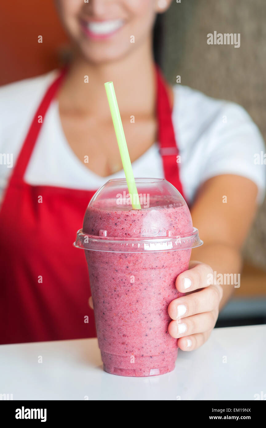 Chef serving strawberry milkshake Stock Photo - Alamy