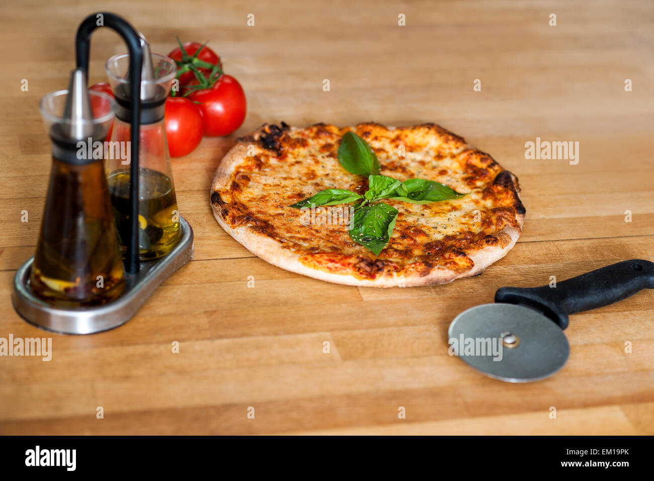 Pizza is ready, please help yourself Stock Photo - Alamy