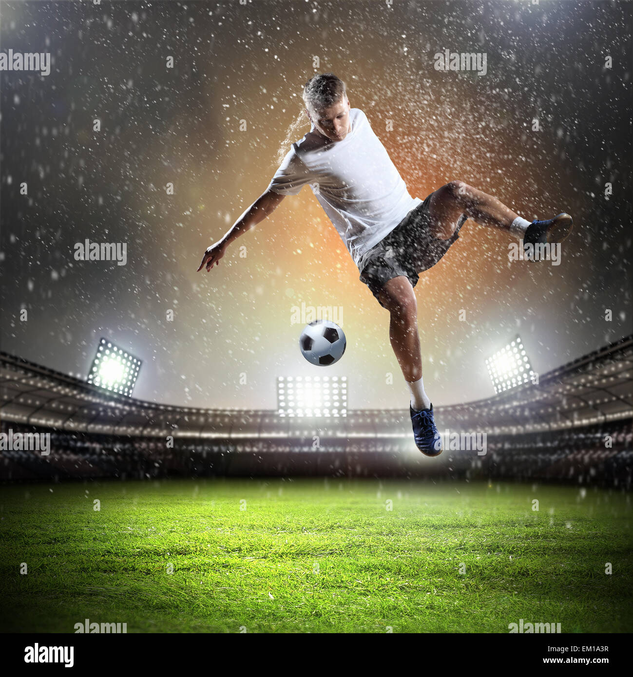 Football player stadium hitting ball hi-res stock photography and ...