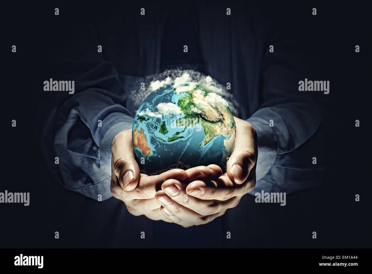 Earth planet in hands Stock Photo - Alamy