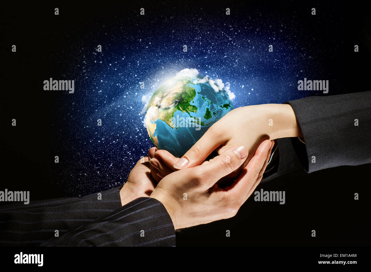 Earth planet in hands Stock Photo - Alamy