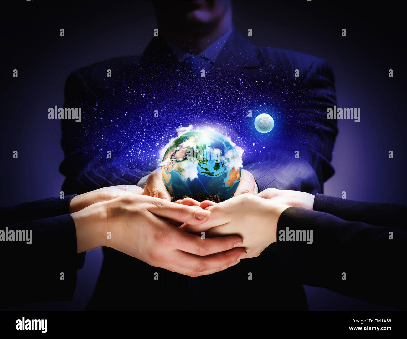 Earth planet in hands Stock Photo - Alamy