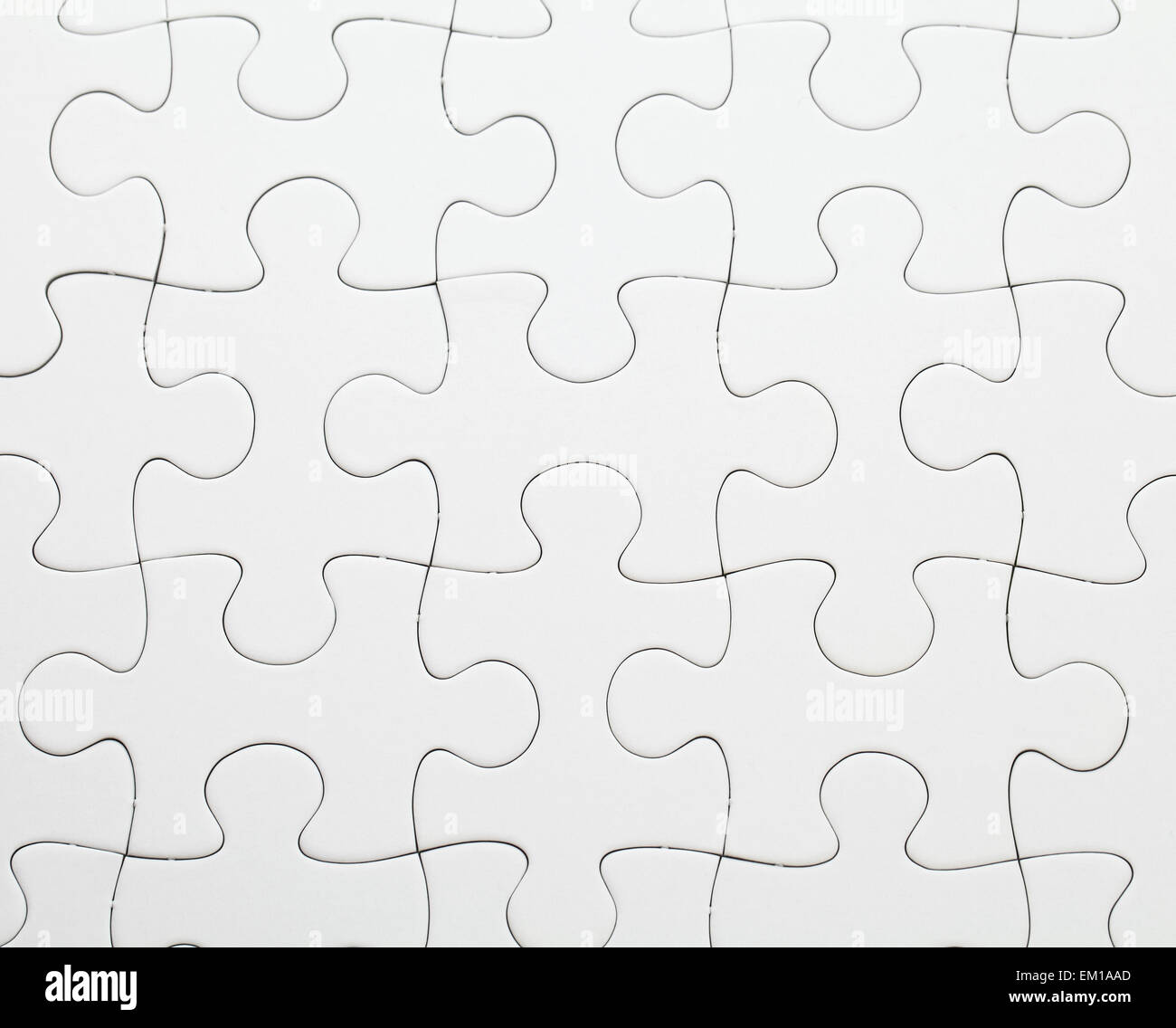 Completed white puzzle Stock Photo - Alamy