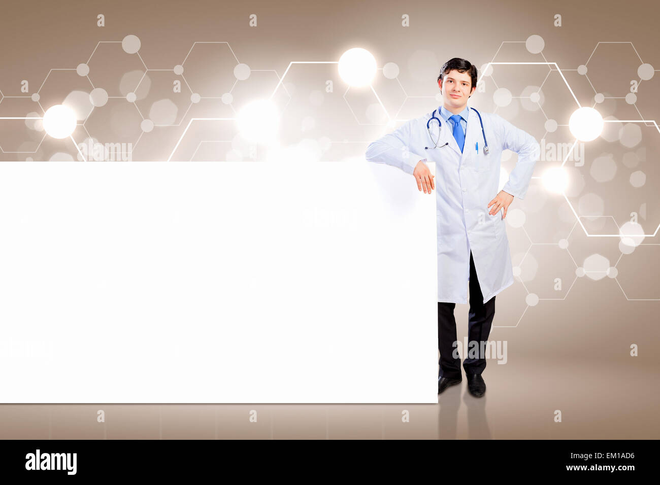 Male doctor with banner Stock Photo - Alamy