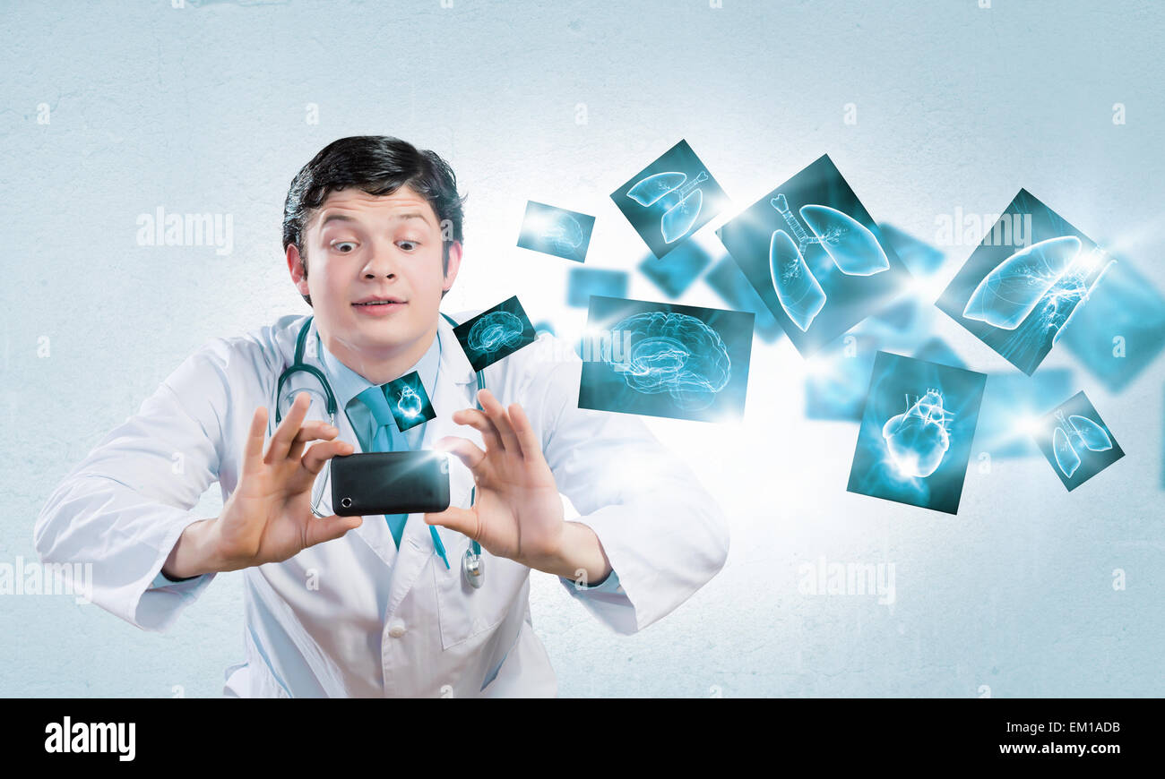 Doctor with photo camera Stock Photo - Alamy